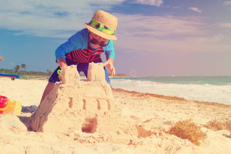 Little Boy Building Sandcastle on Tropical Beach Stock Photo - Image of ...