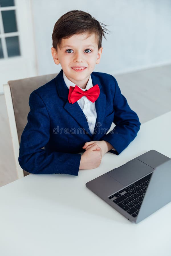 Little Boy in Business Suit Sitting at Laptop Stock Photo - Image of ...