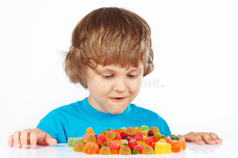Little Child with Colored Jelly Candies on White Background Stock Image ...