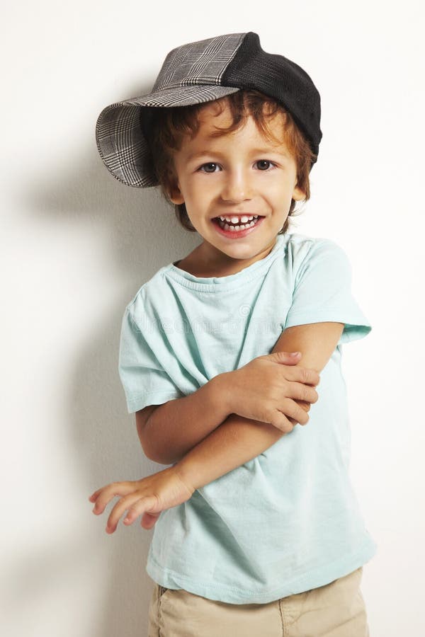 Little boy with cap stock photo. Image of childhood, student - 26924772