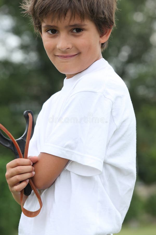 Little boy with catapult stock photo. Image of dangerous - 31993464