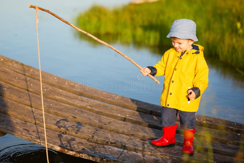 Boy Reeling In A Fish