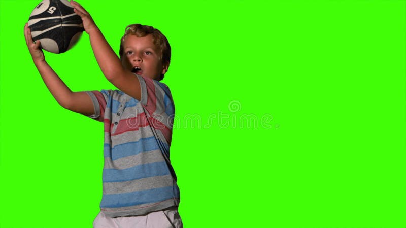 Little Boy Catching Rugby Ball on Green Screen Stock Footage - Video of ...