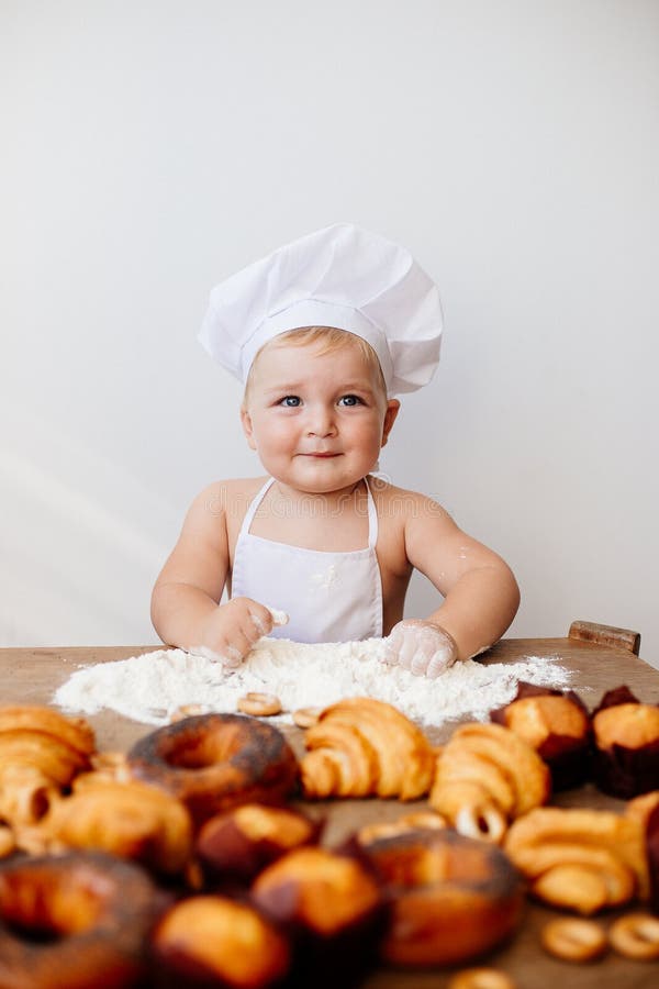 Little child cook. stock image. Image of cooking, cheerful - 128077519