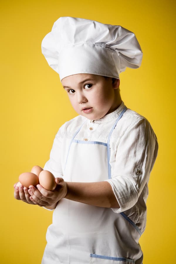 Little boy chef in uniform stock image. Image of white - 37701223
