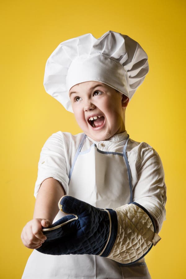 Little boy chef in uniform stock image. Image of childhood - 37521147