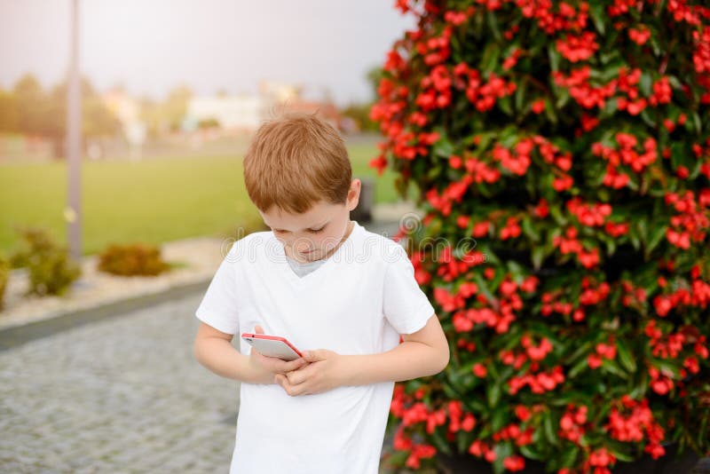 Little Boy Child Playing Mobile Games on Smartphone Stock Photo - Image ...