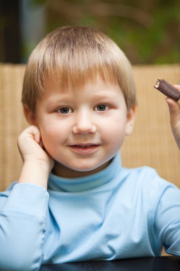 Little Boy with Chocolate Candy Stock Image - Image of snack, person ...