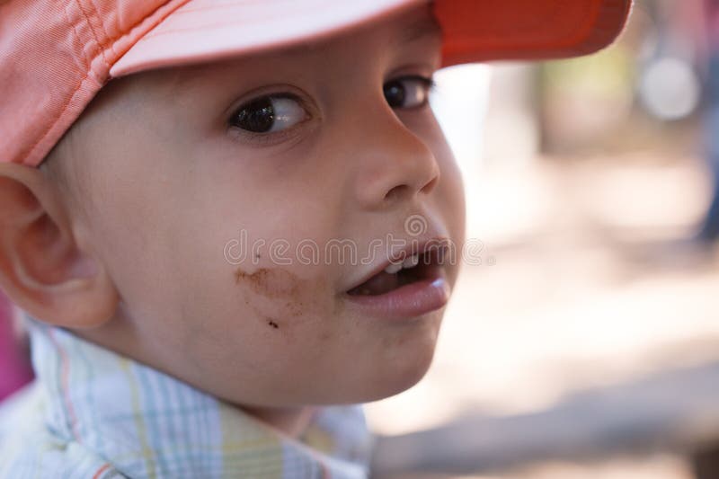 Little Boy with Chocolate Dirty Face Stock Image - Image of holding ...