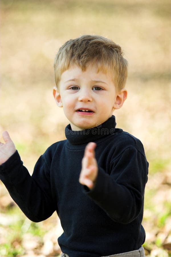A little boy clapping stock photo. Image of playground - 1713988
