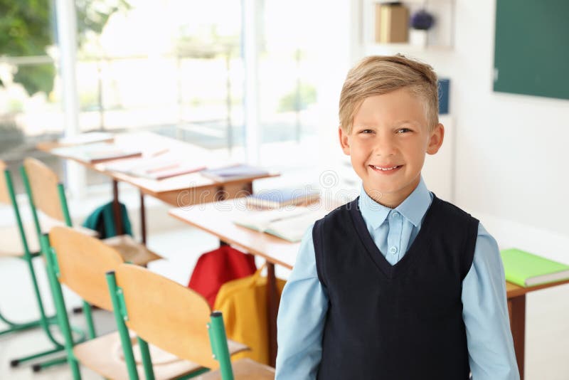 Little Boy in Classroom. Stylish Uniform Stock Image - Image of person ...