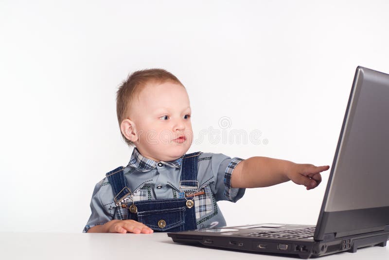 Little boy and computer stock image. Image of portrait - 20430141