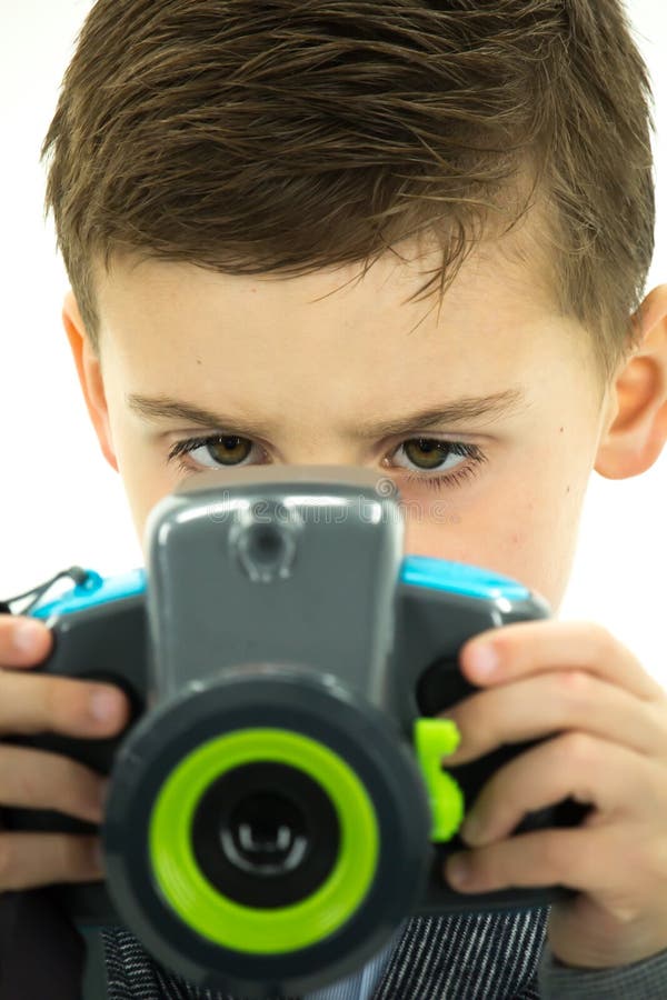 Little Boy Concentrating on His Camera Stock Image - Image of young ...