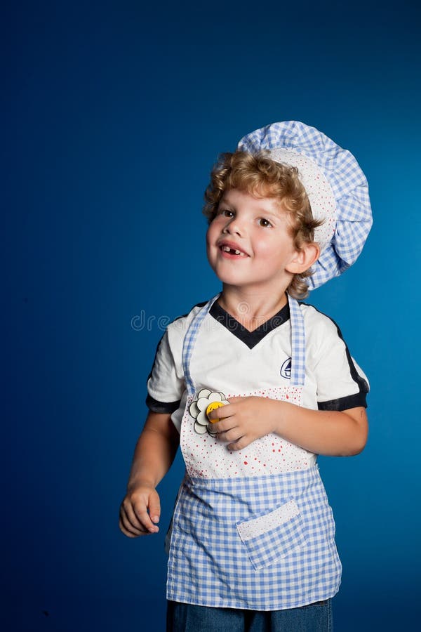 Little boy cook stock image. Image of apron, people, childhood - 79522553