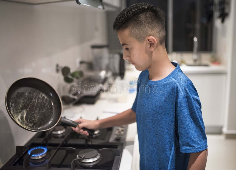 Little Boy Cooking in the Kitchen Stock Image - Image of home, cook ...