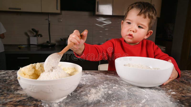 Little Boy Cooking in the Kitchen Stock Image - Image of helping ...