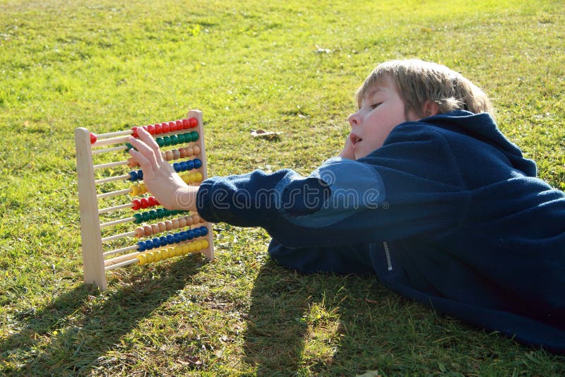 Little Boy Counting on an Abacus Stock Image - Image of blue, abacus ...