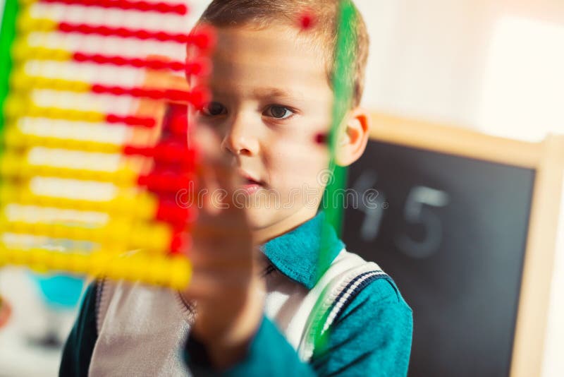 Little Boy Counting with Abacus Stock Photo - Image of intelligence ...