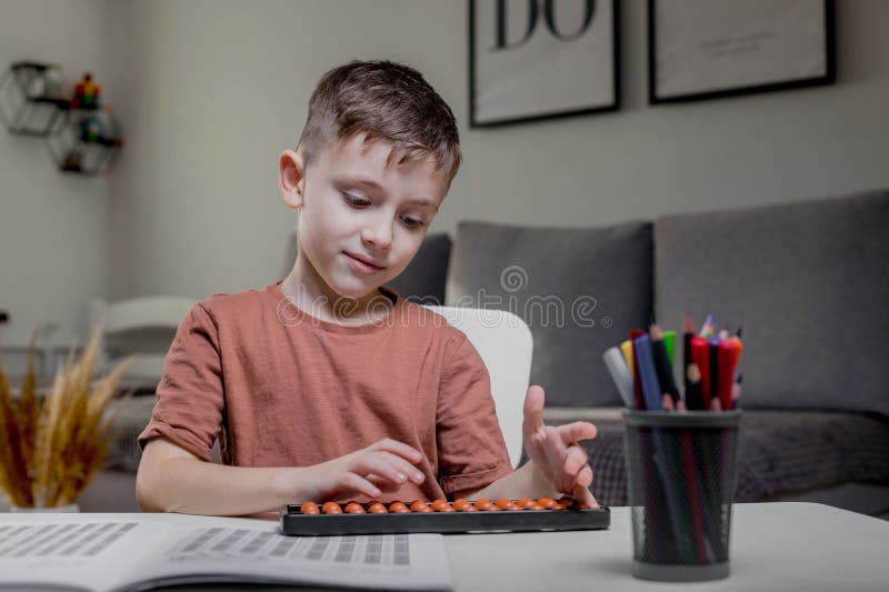 Little Boy Counting with Help an Abacus. Mental Arithmetic, Brain ...