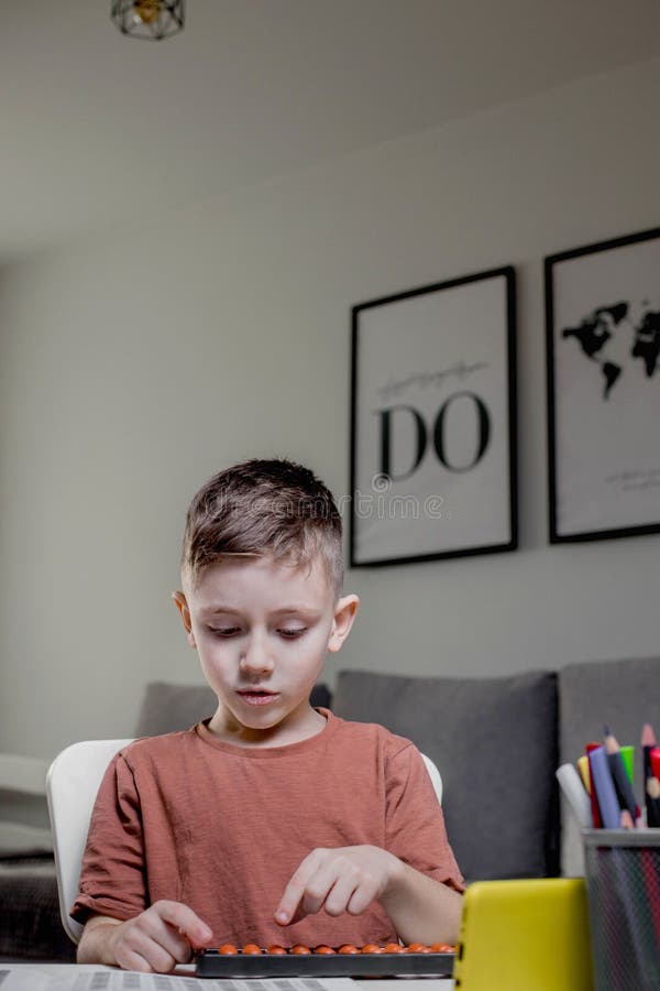 Little Boy Counting with the Help of Mental Arithmetic. Mathematics in ...