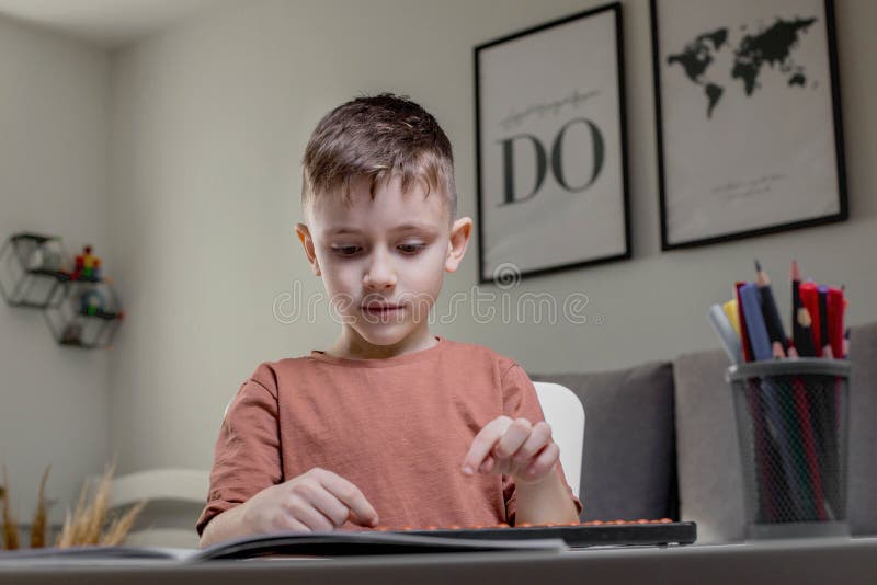 Little Boy Counting with the Help of Mental Arithmetic. Mathematics in ...