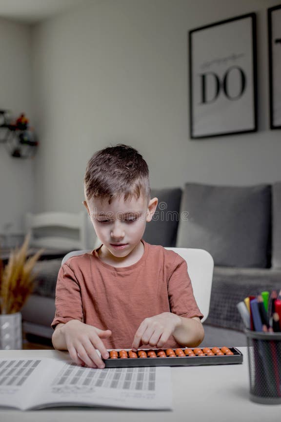 Little Boy Counting with the Help of Mental Arithmetic. Mathematics in ...