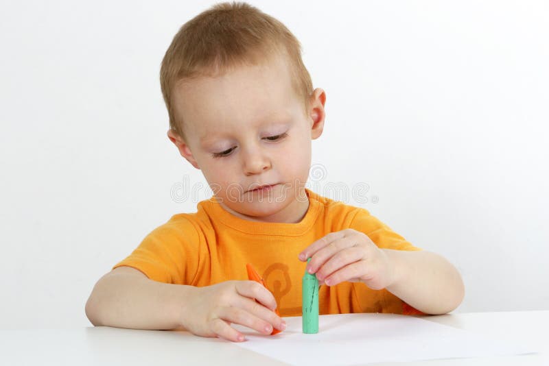 Little boy with crayons stock image. Image of addiction - 34415809