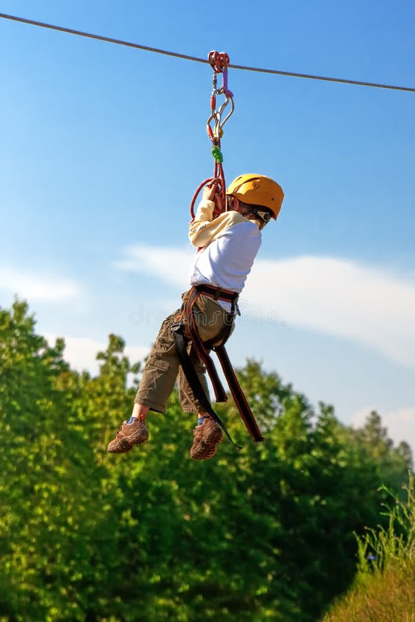 Little Boy Crossing Ravine on Rope Stock Image - Image of cord, high ...