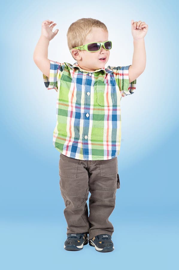 Kid playing in the studio stock image. Image of isolated - 16576561