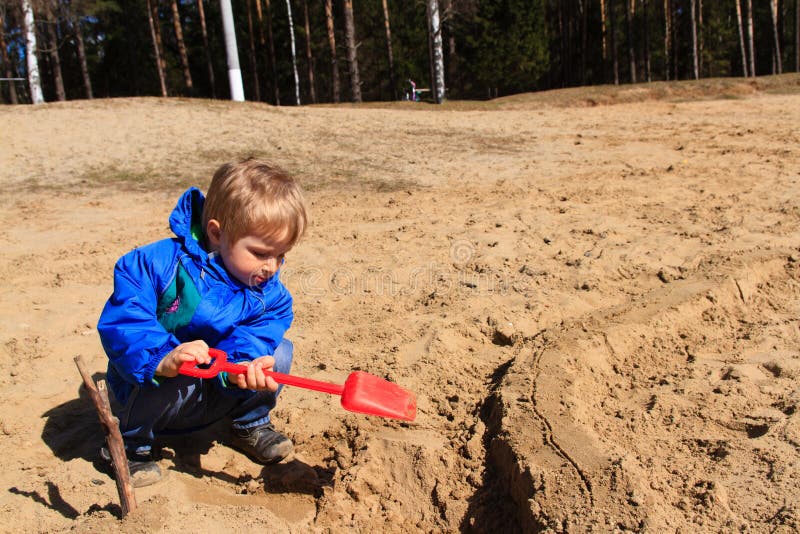 Little Boy Digging Sand in Spring Stock Photo - Image of autumn ...