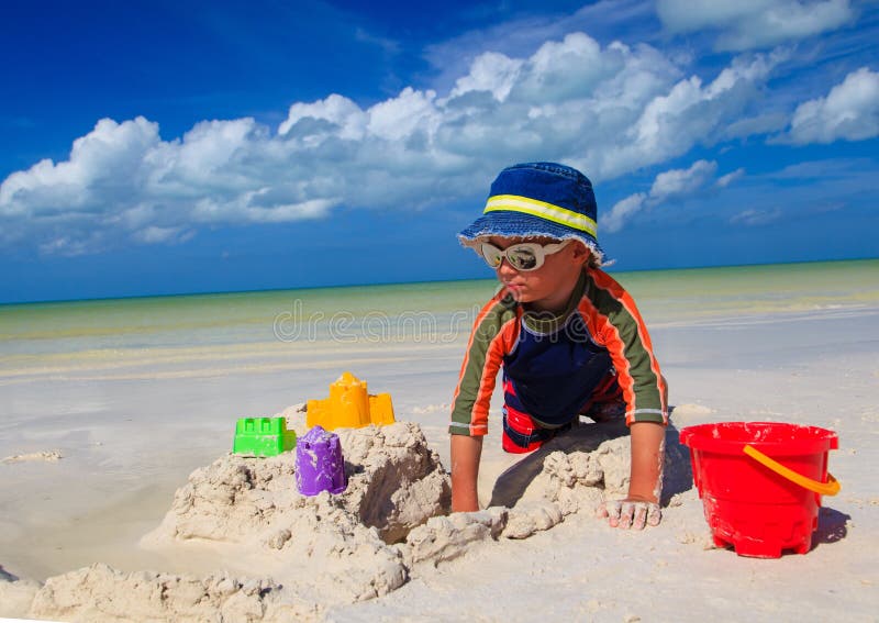 Little Boy Digging Sand on Tropical Beach Stock Image - Image of ...