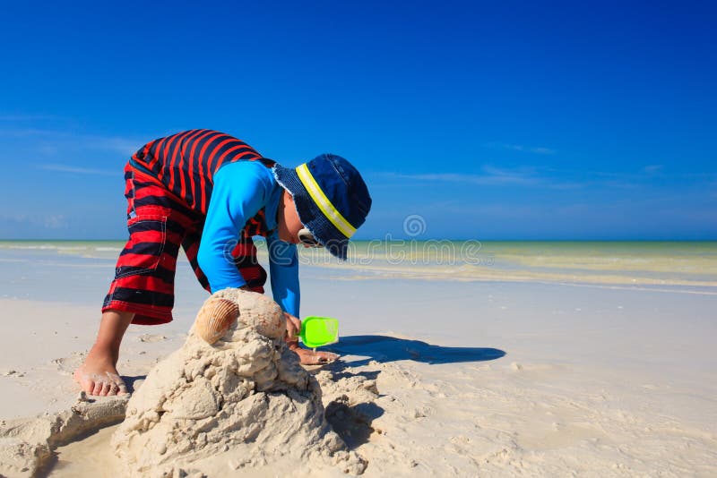 Little Boy Digging Sand on Tropical Beach Stock Photo - Image of ...