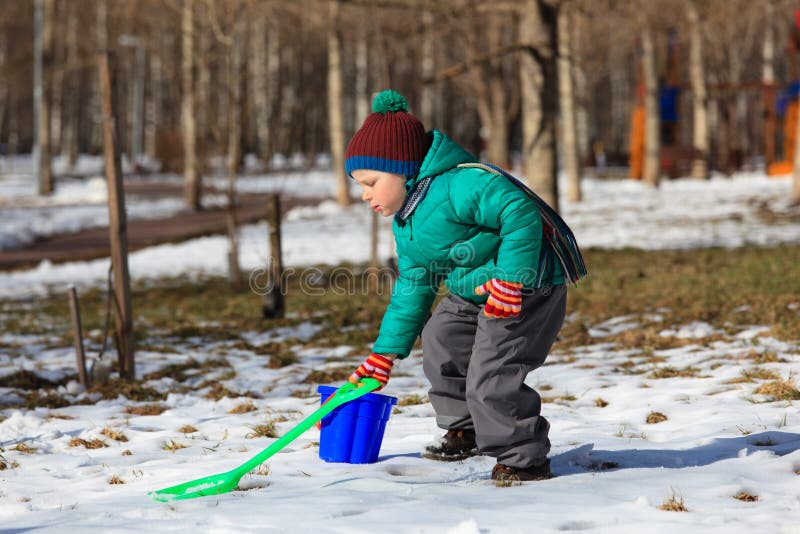 Little Boy Digging in Winter Park Stock Photo - Image of childhood ...