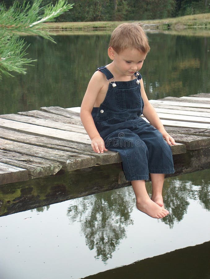 Little boy on dock stock image. Image of fashioned, dock - 2445827
