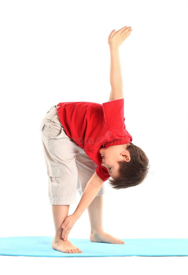The Little Boy Does Exercise. Stock Image - Image of meditating ...