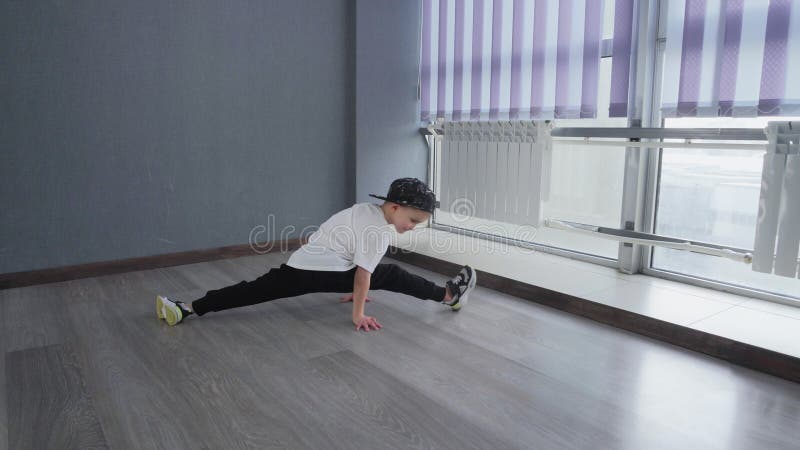 Little Boy Do Exercise To Warm Up To Get Ready for Breakdance Hip-hop ...