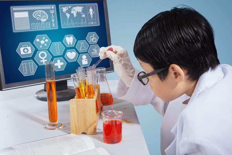 Little Boy Doing Chemistry Research on Desk Stock Image - Image of ...