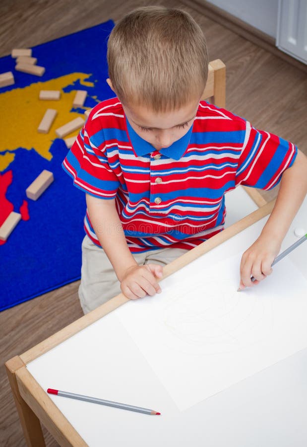 Little boy drawing stock photo. Image of cute, holding - 20562538