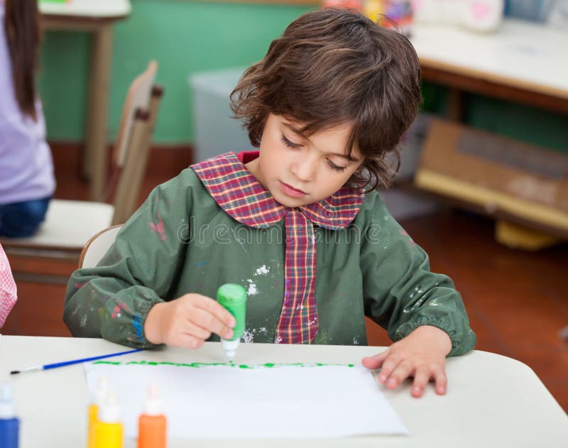 Little Boy Drawing In Art Class Stock Image - Image of friend, learning ...