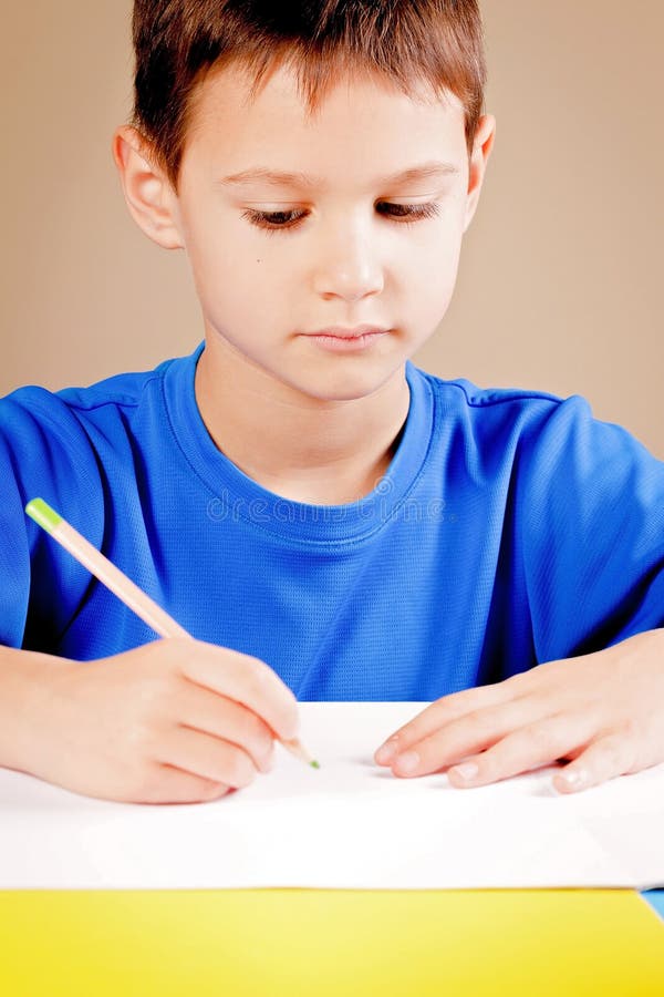 Little Boy Drawing with Colored Pencils Stock Photo - Image of ...