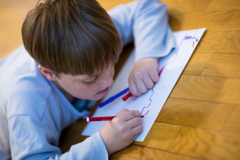 Little boy drawing at home stock image. Image of toddler - 245580835