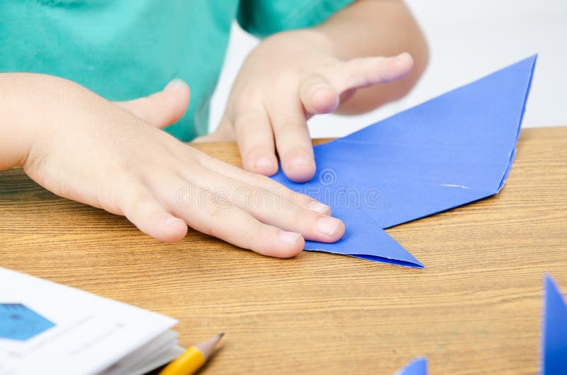 Little Boy Drawing on Paper Art Origami Stock Photo - Image of girl ...