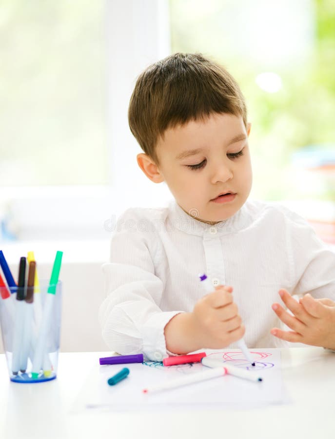 Little Boy is Drawing on White Paper Stock Image - Image of caucasian ...