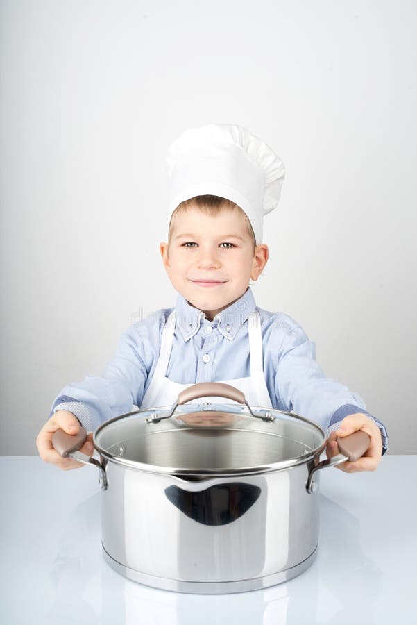 Little Boy Dressed Like a Chef Stock Image - Image of male, apron: 51507663