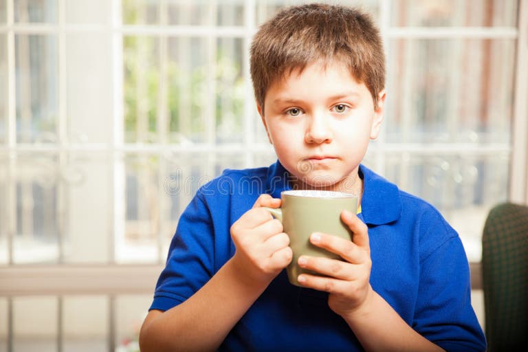 Little boy drinking coffee stock photo. Image of latin - 51315864