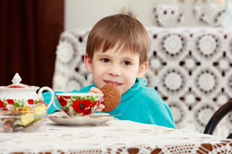 Little Boy Drinking Tea at the Table. Stock Image - Image of classic ...