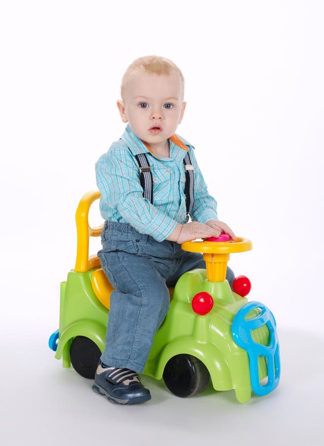 Little Boy Driving on Toy Car Stock Image - Image of human, child: 83807113