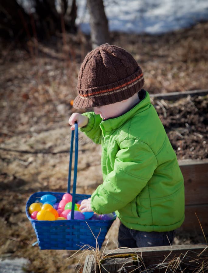 Little Boy with Easter Basket and Eggs Stock Photo - Image of family ...