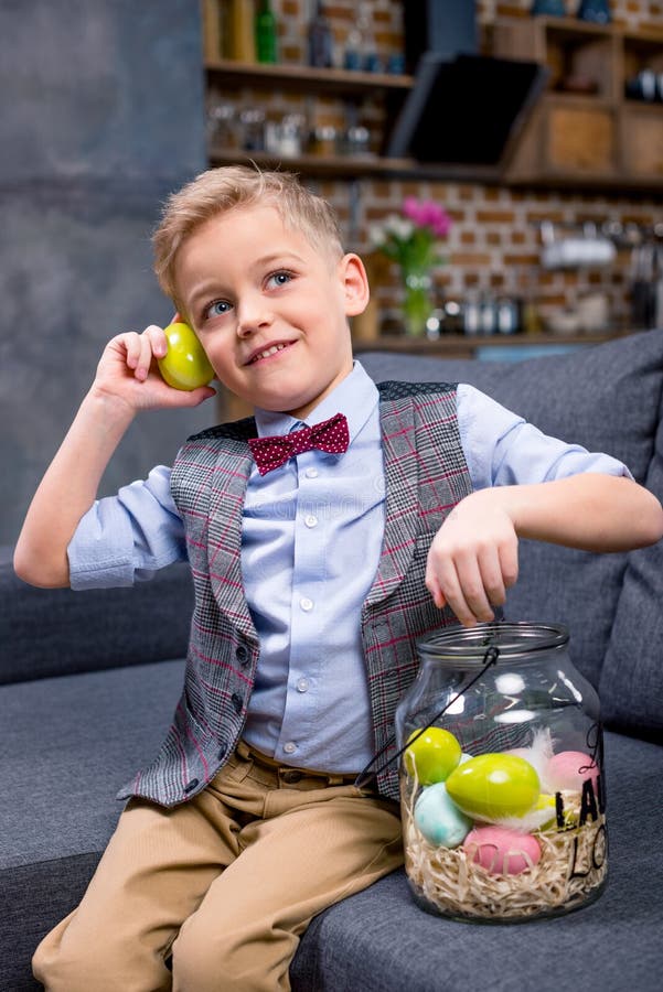 Little Boy with Easter Eggs Stock Image - Image of holiday, sofa: 90719831