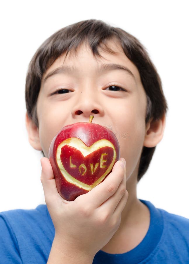 Little Boy Eating Apple , Love Word on Skin Focus on Apple Isolate ...